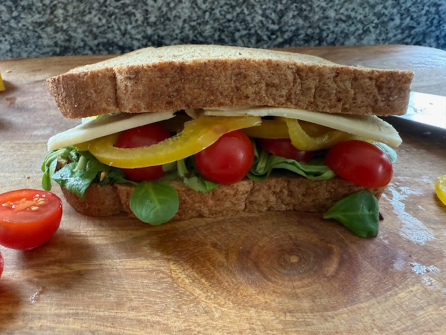 BETWEEN TWO SLICES: THE SURPRISING STORY AND ETHICS OF THE SANDWICH ...